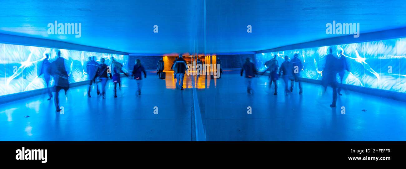 tunnel with pedestrians in motion in blue cool light Stock Photo - Alamy