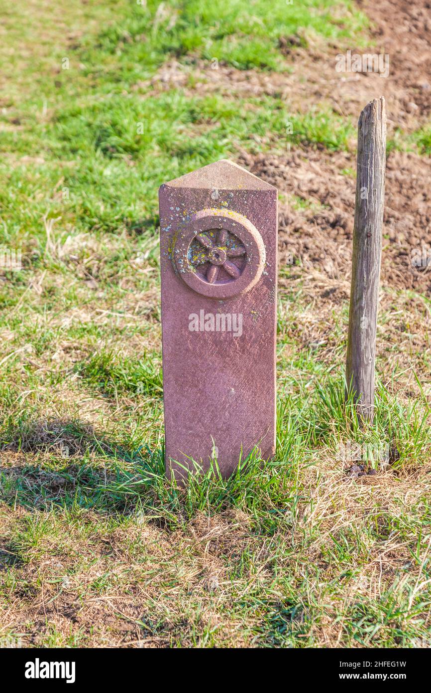 historic boundary stone in the field Stock Photo - Alamy