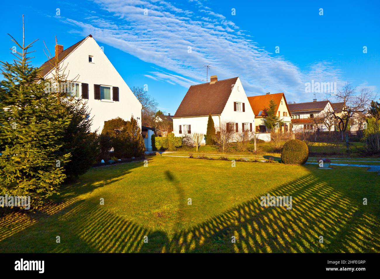 generic family home in suburban area with blue sky Stock Photo - Alamy
