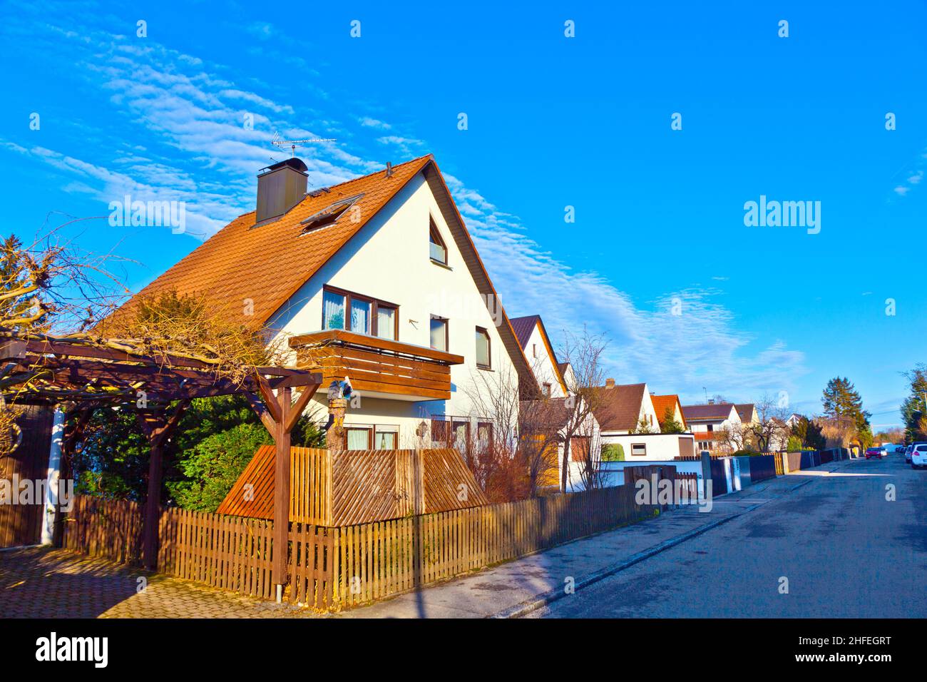 generic family home in suburban area with blue sky Stock Photo - Alamy