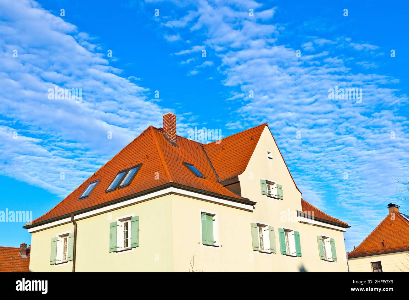 generic family home in suburban area with blue sky Stock Photo - Alamy