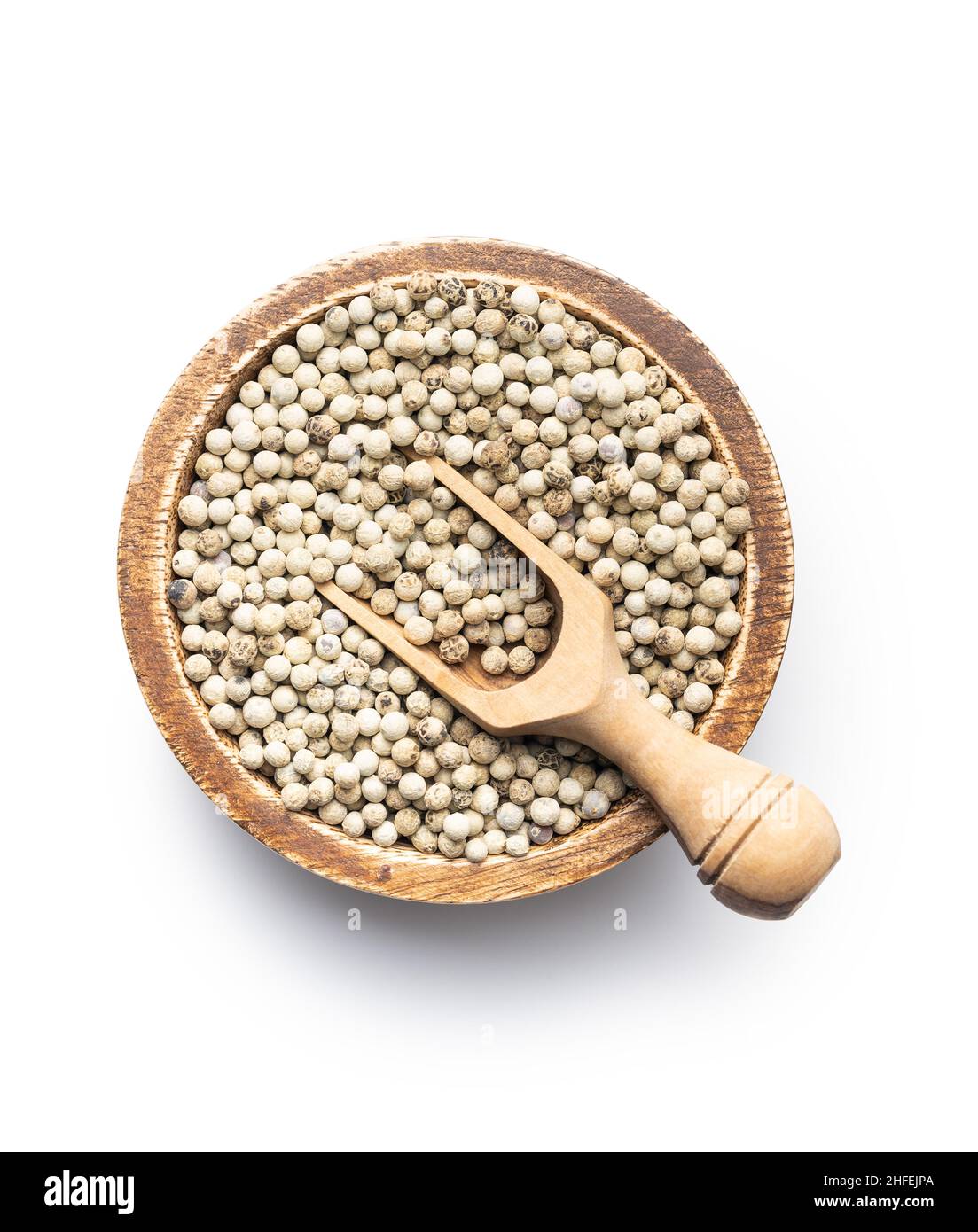 Whole pepper spice. White peppercorn grain in bowl isolated on white ...