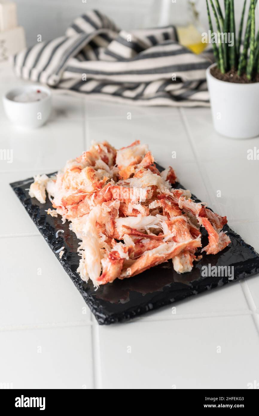 Natural crab meat without additives. Pure product. Serving on a light ...
