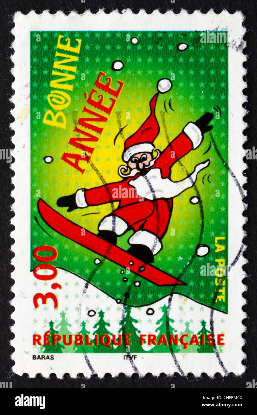 FRANCE - CIRCA 1998: a stamp printed in the France shows Santa Claus ...