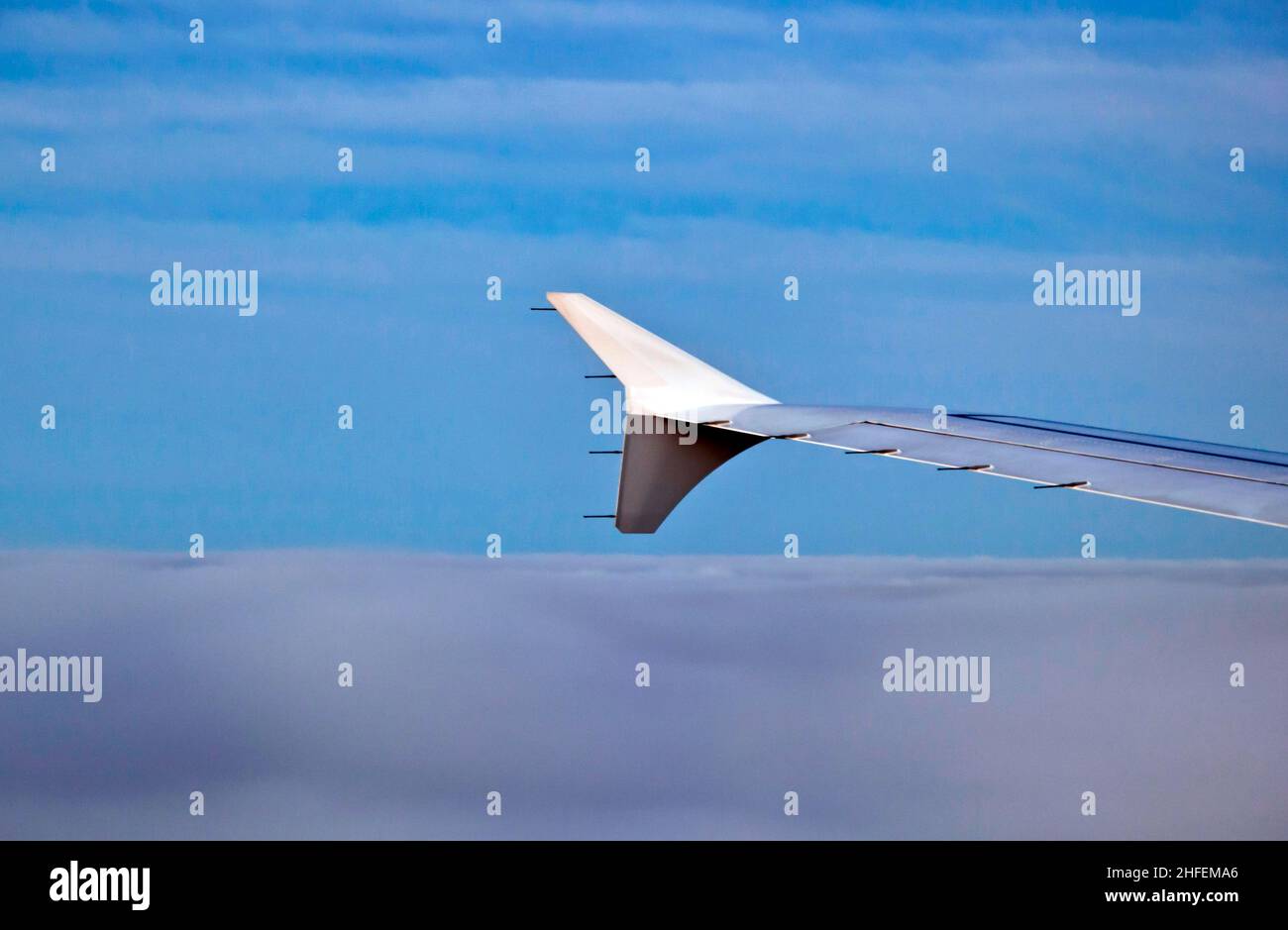 wing of aircraft in the sky Stock Photo - Alamy