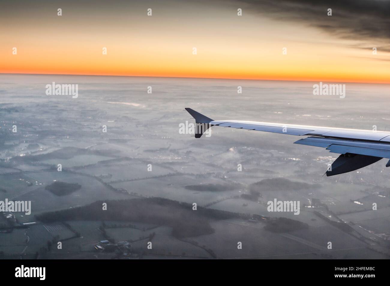 Jet wing in sunrise hi-res stock photography and images - Alamy