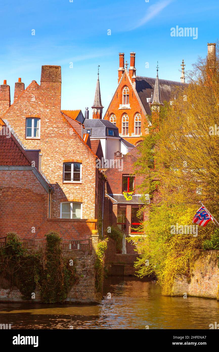 Bruges, Belgium iconic cityscape with medieval houses, towers and ...