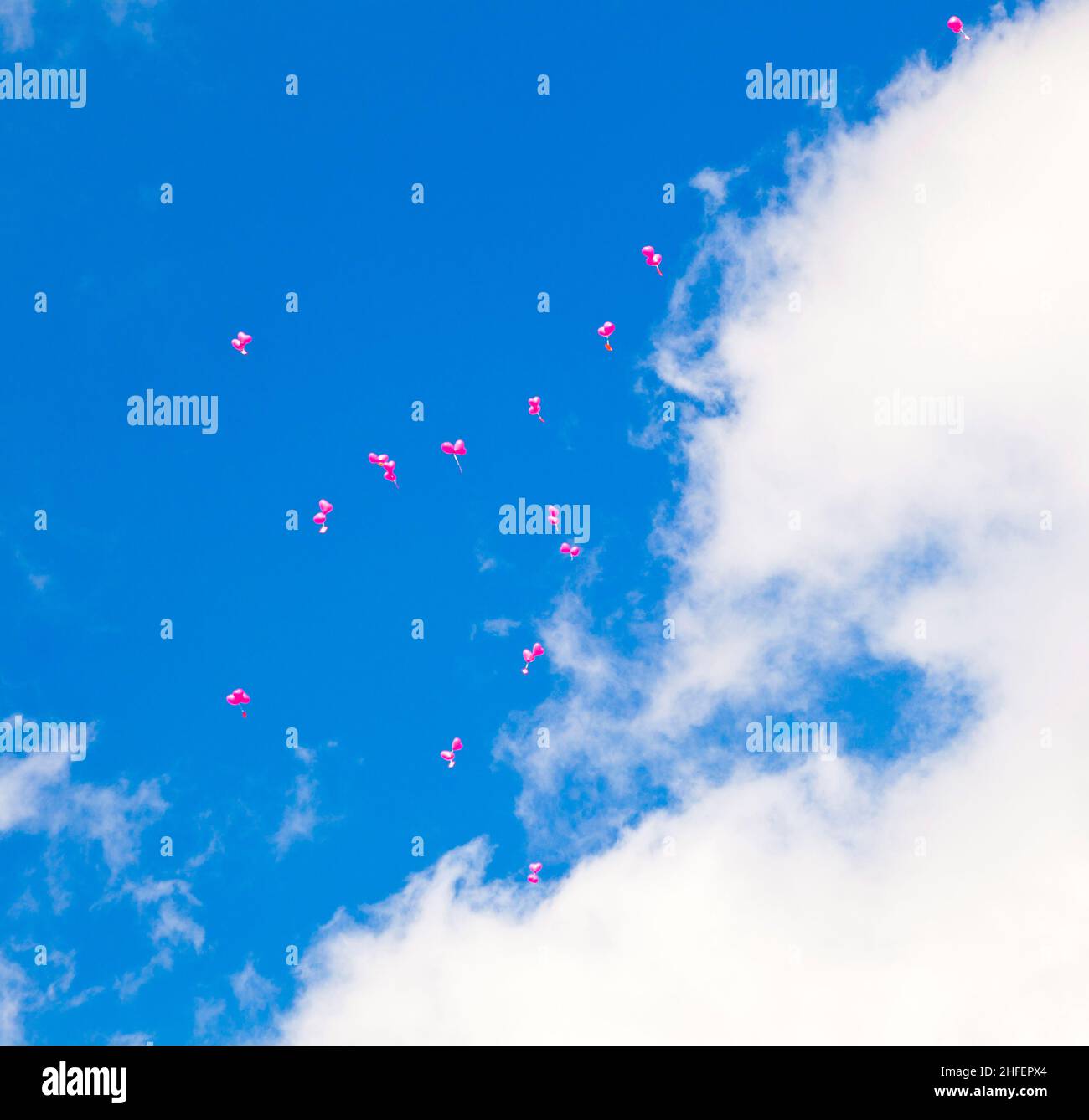 Red balloon message in sky hi-res stock photography and images - Alamy