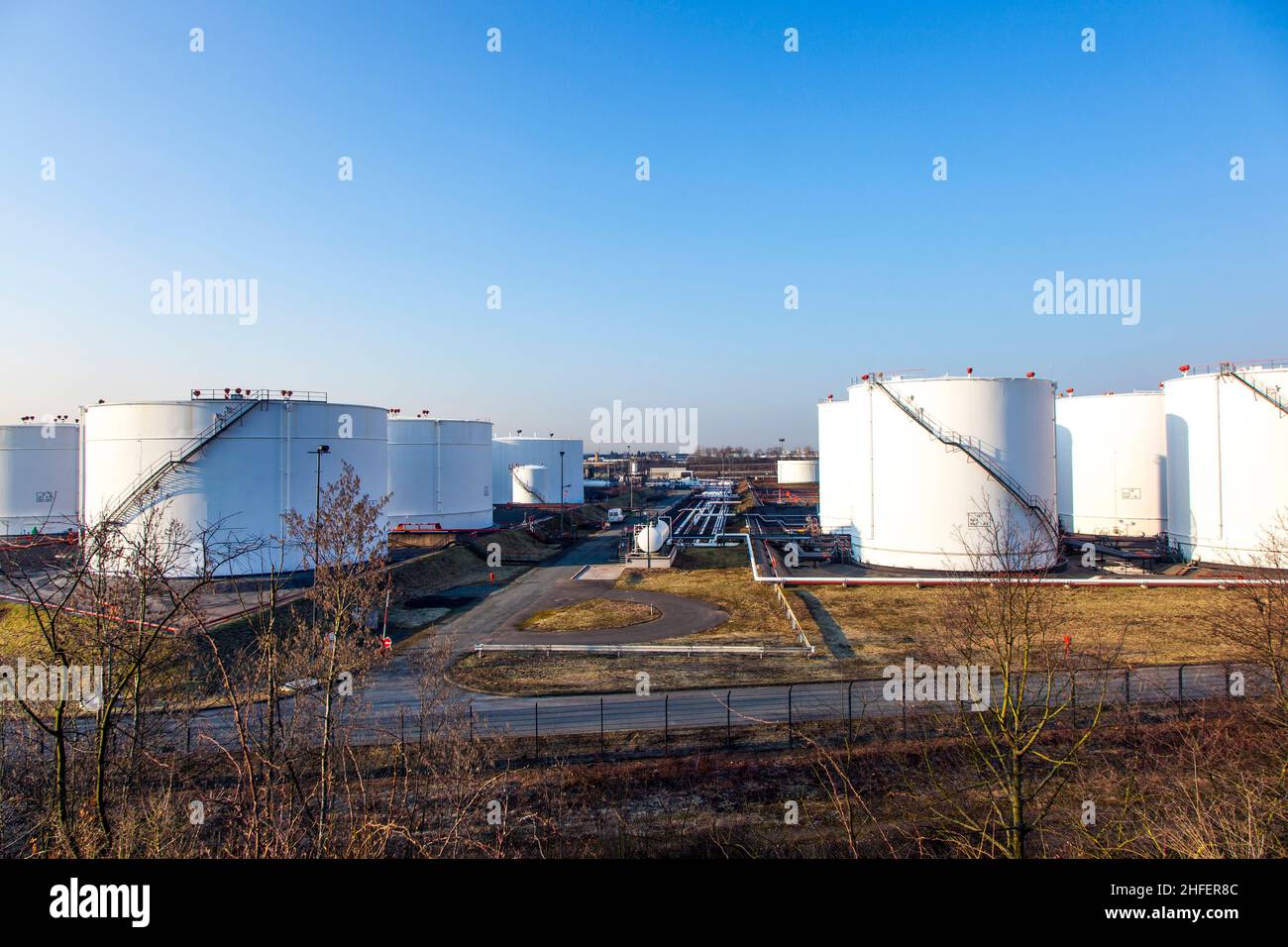white tank in tank farm with blue sky Stock Photo - Alamy