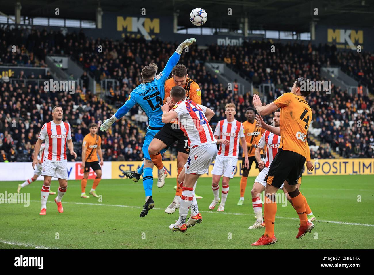 Jack Bonham #13 of Stoke City flicks the ball out unresponsive pressure ...