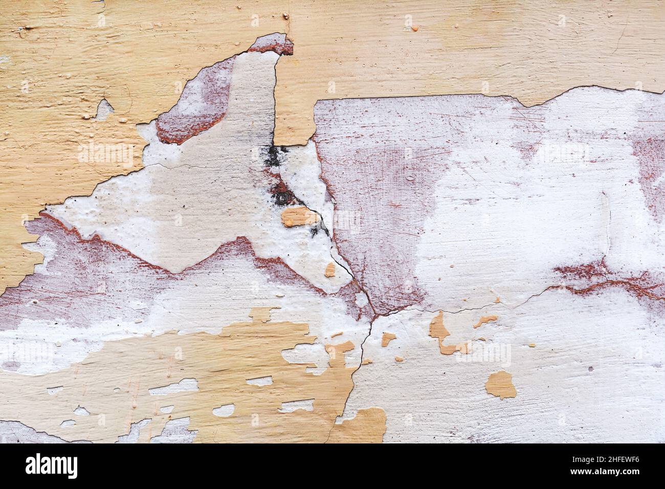 Concrete, weathered, worn, damaged wall paint. Rough, concrete surface ...