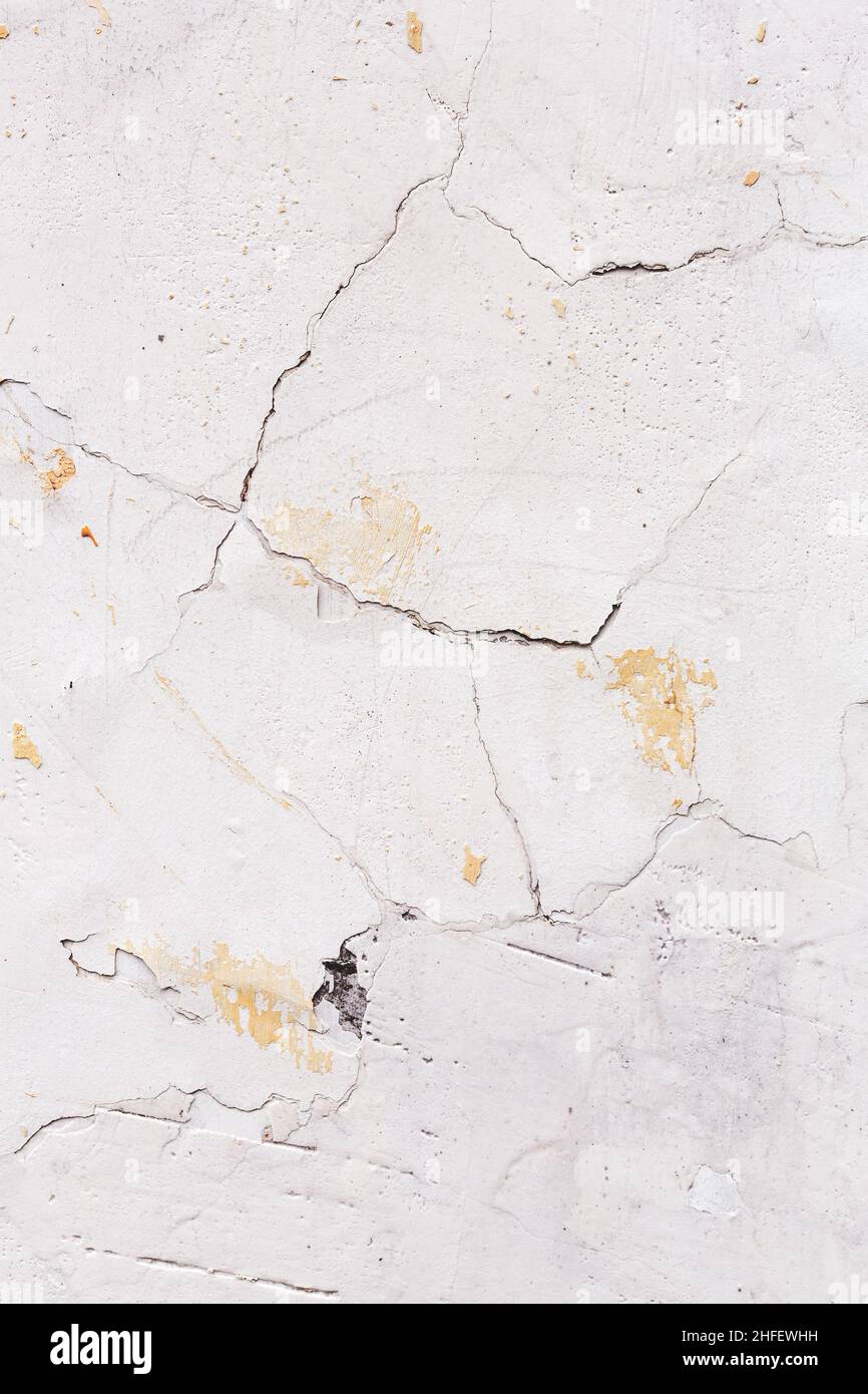 Concrete, weathered, worn, damaged wall paint. Rough, concrete surface ...