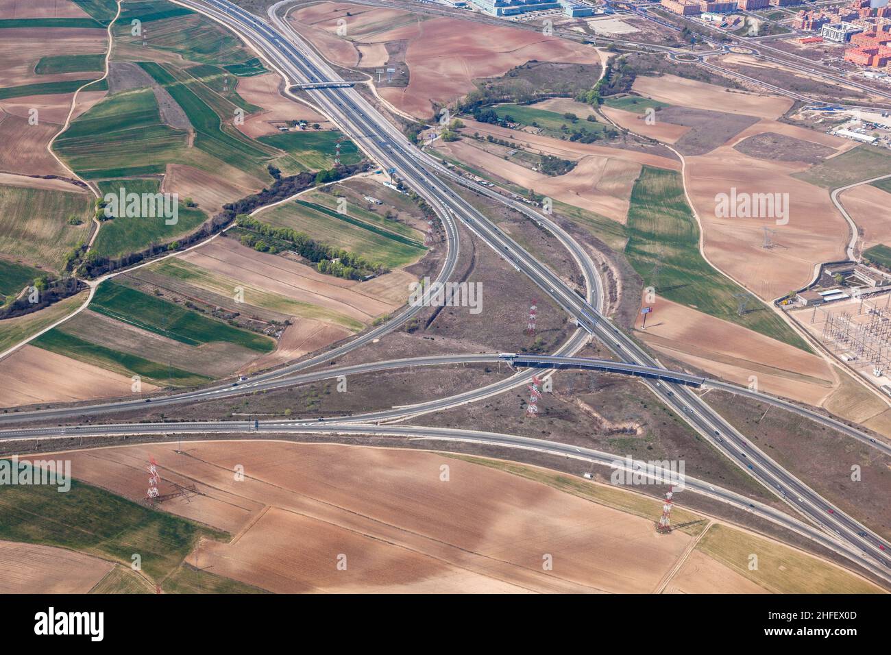 aerial of electrical pylon in rural area with highway Stock Photo - Alamy