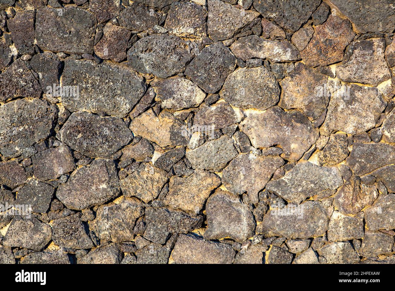 typical wall made seamless from volcanic stone Stock Photo - Alamy