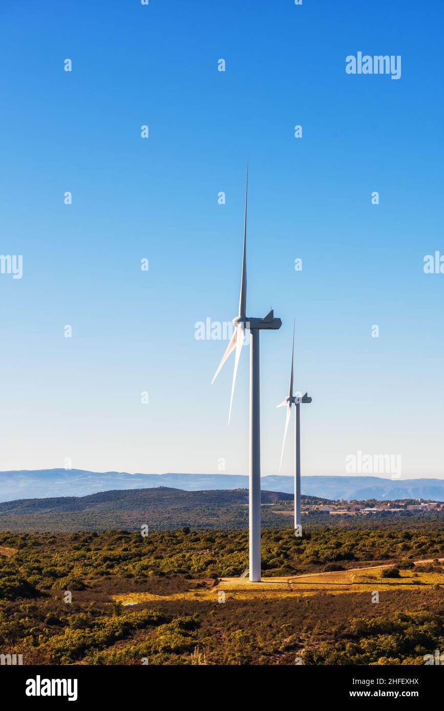 Wind turbines on a beautiful blue sky in a mountain wind farm in ...