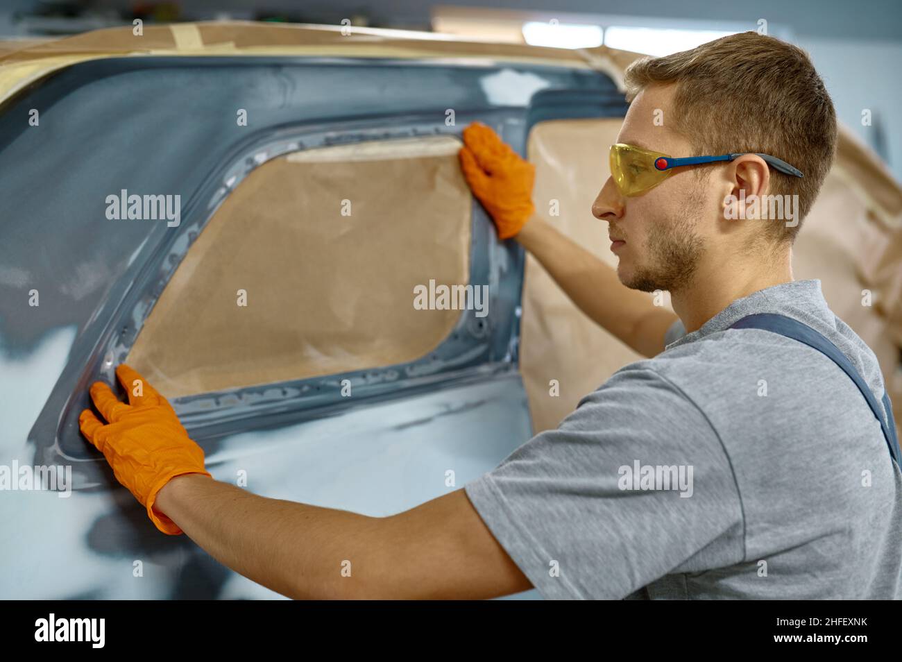 Applying body paint hi-res stock photography and images - Alamy