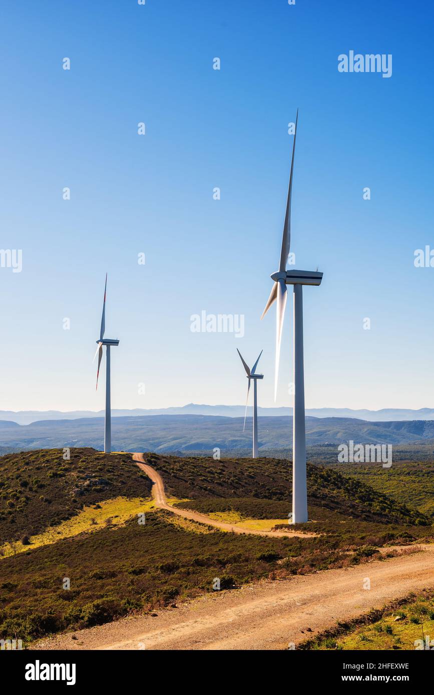 Wind turbines on a beautiful blue sky in a mountain wind farm in ...