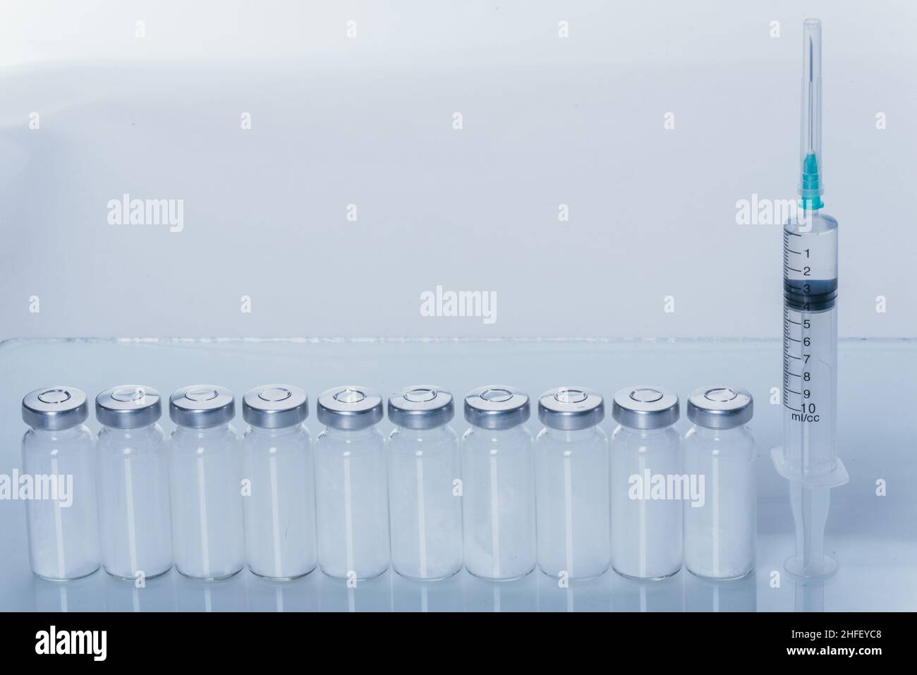 Medicine, Injection, vaccine and disposable syringe, drug concept ...