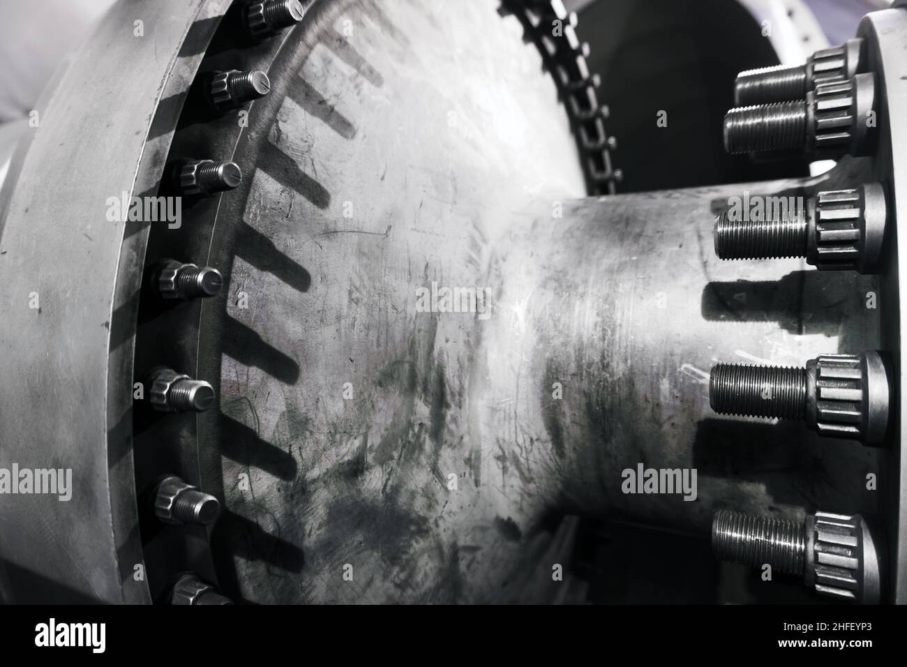 The rotor of a gas turbine compressor with a bolted coupling half ...