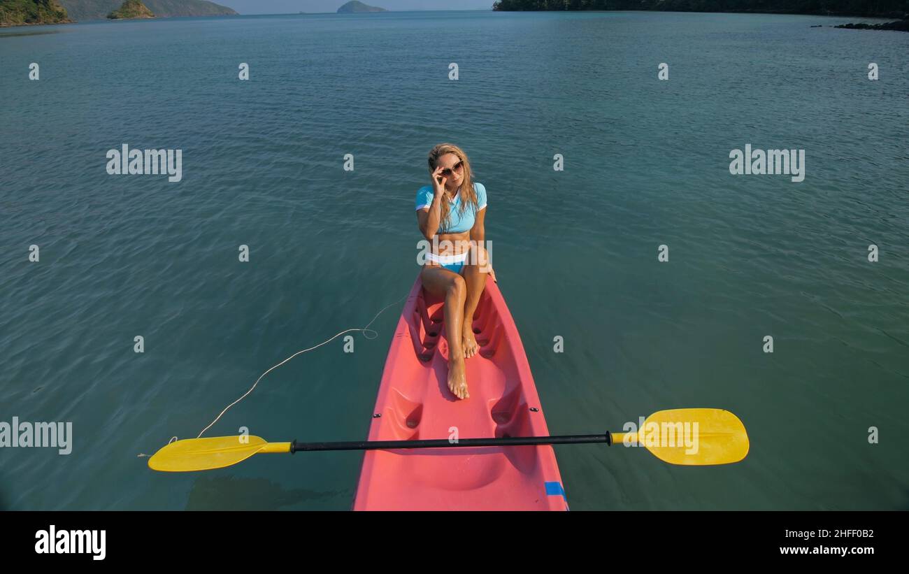 Woman in bikini in kayak hi-res stock photography and images - Alamy