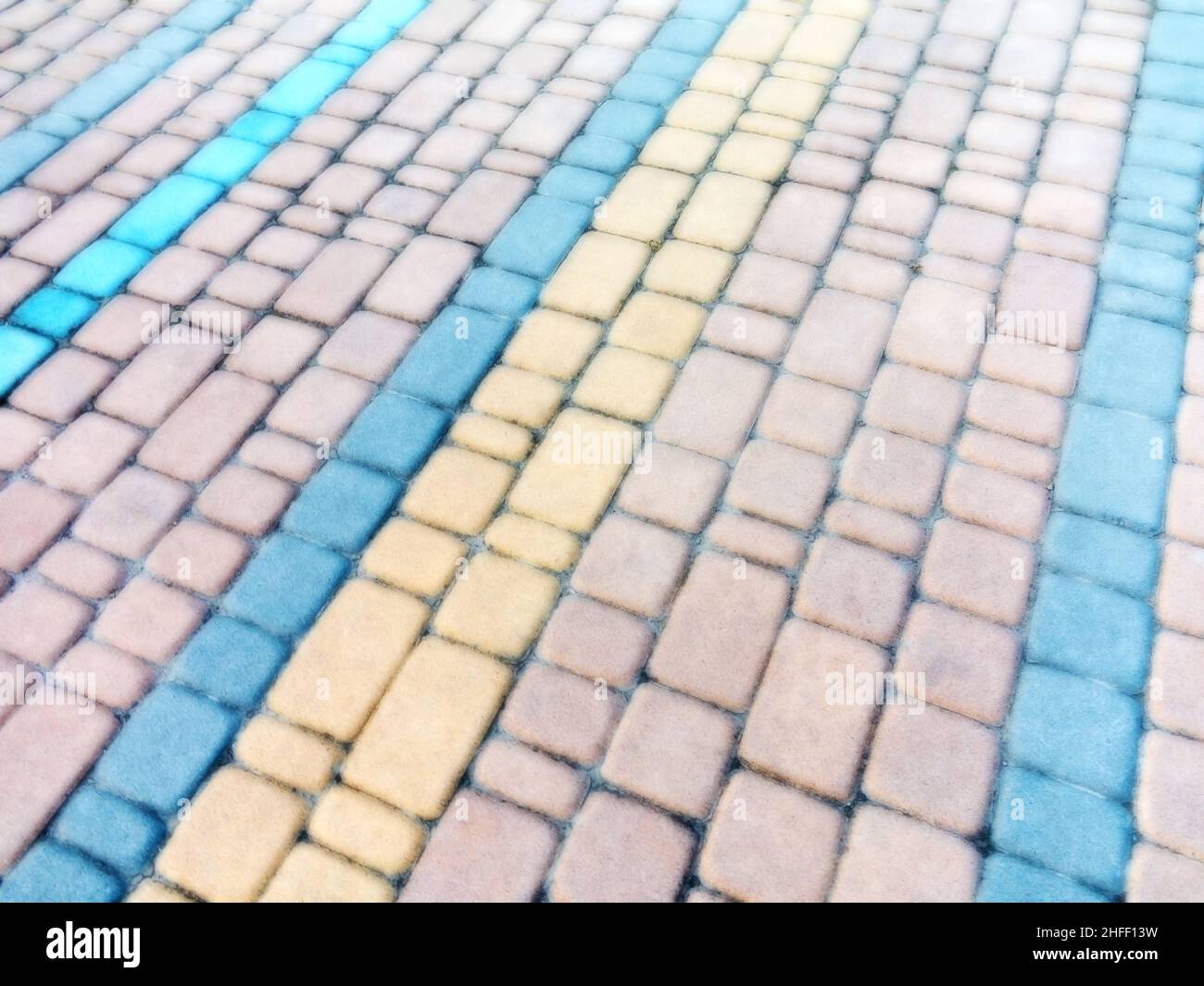 Abstract blurred background decorative paving slabs viewed at a slight ...