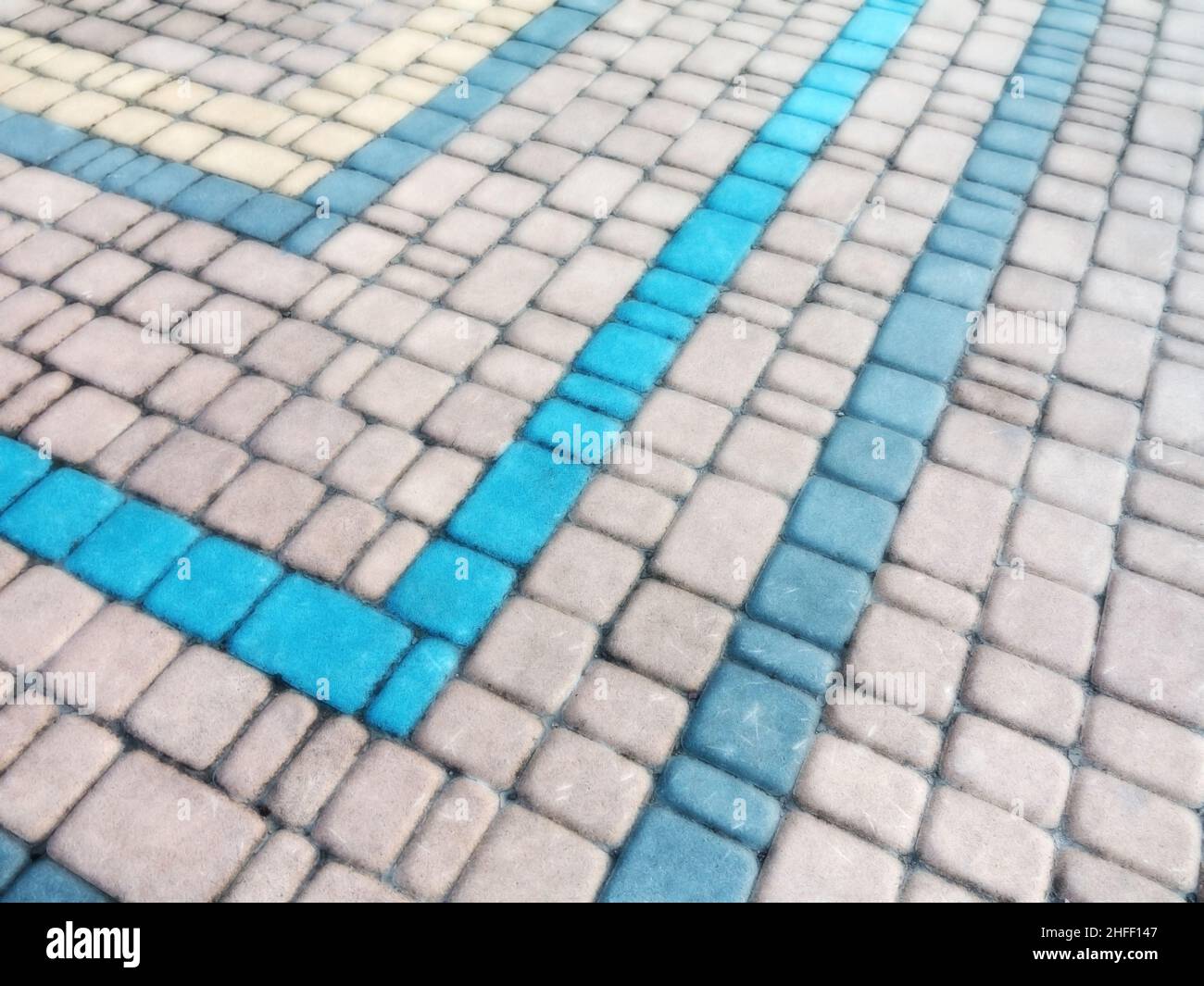 Abstract blurred background decorative paving slabs viewed at a slight ...