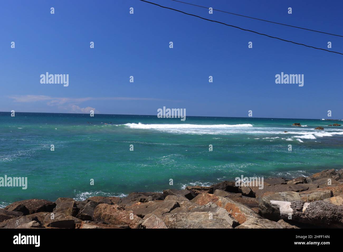 Fantastic Rocky coast. Sea waves impact rocky on the beach Stock Photo ...