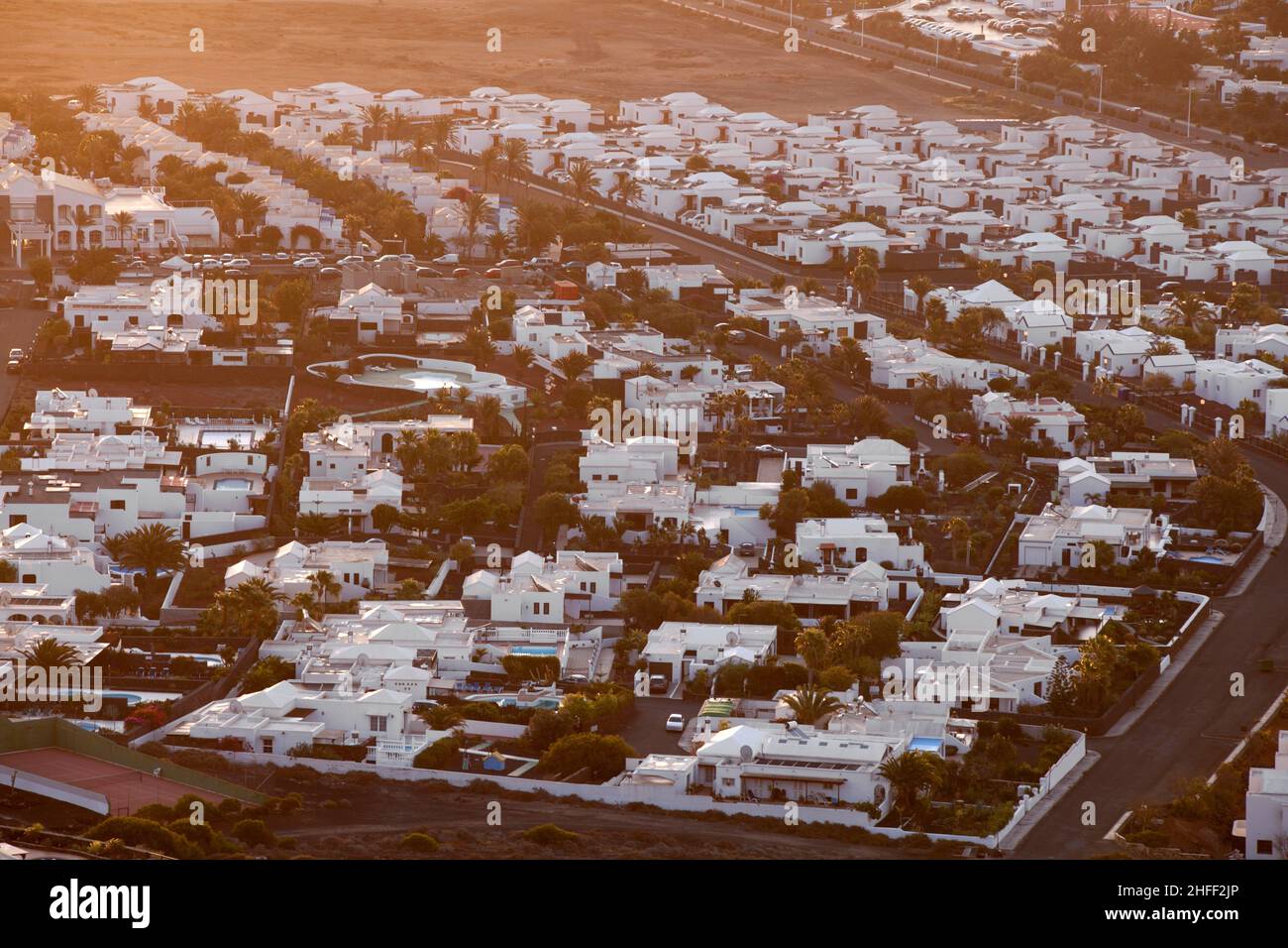 settlement of new houses all in same style Stock Photo - Alamy