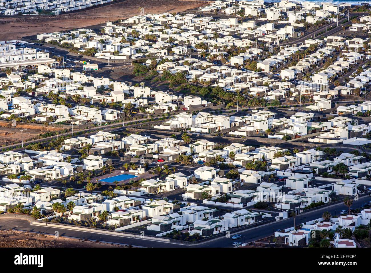 settlement of new houses all in same style Stock Photo - Alamy