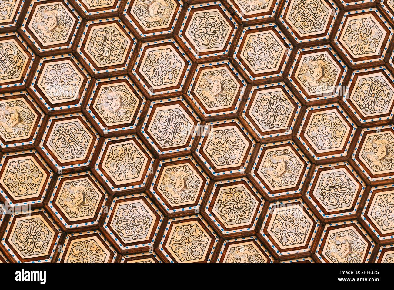 The ceiling of the hall Plaza de Espana decorated with beautiful tiles ...