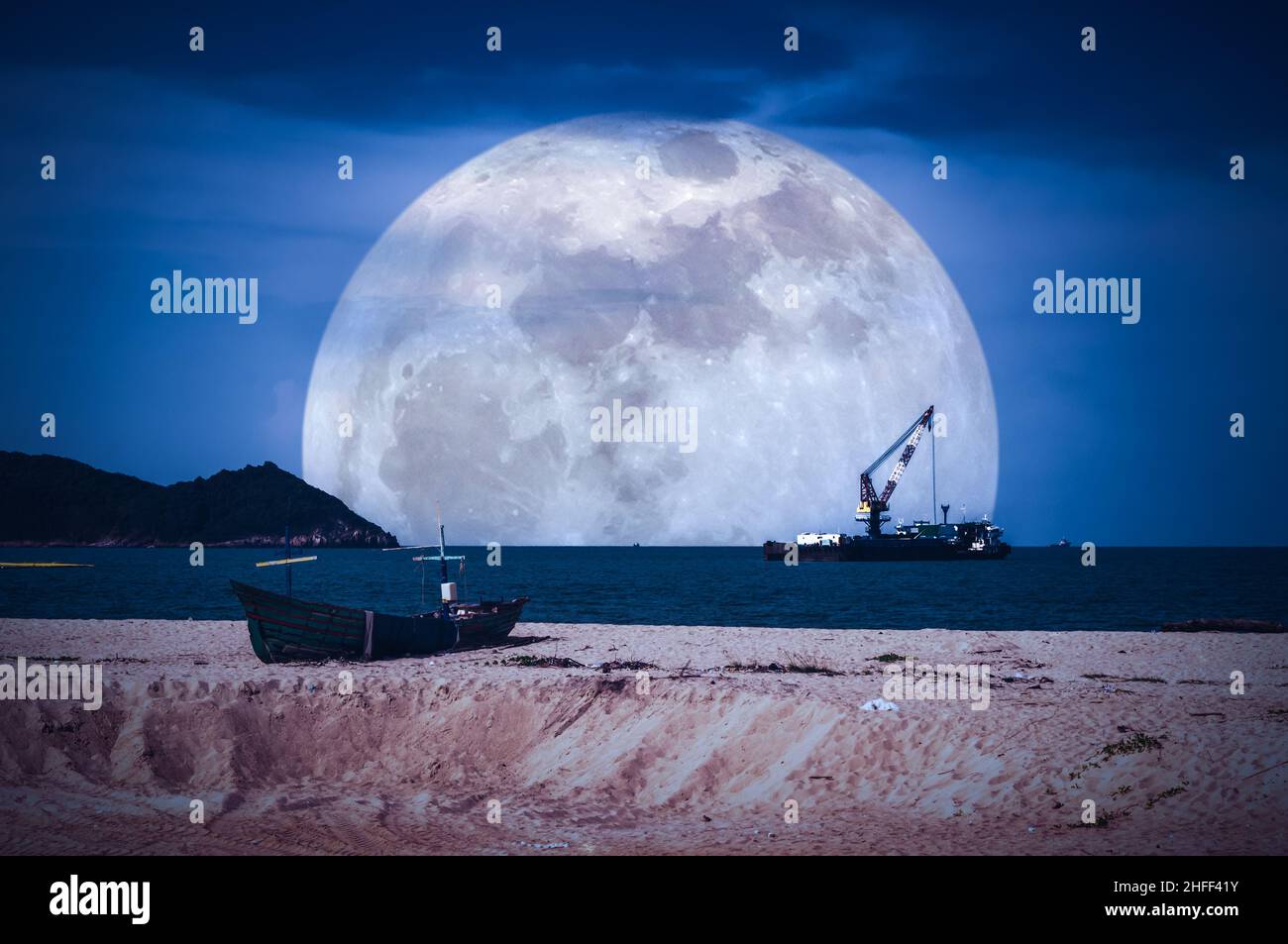Photo Manipulation. Beautiful night sky with super moon above cargo ...