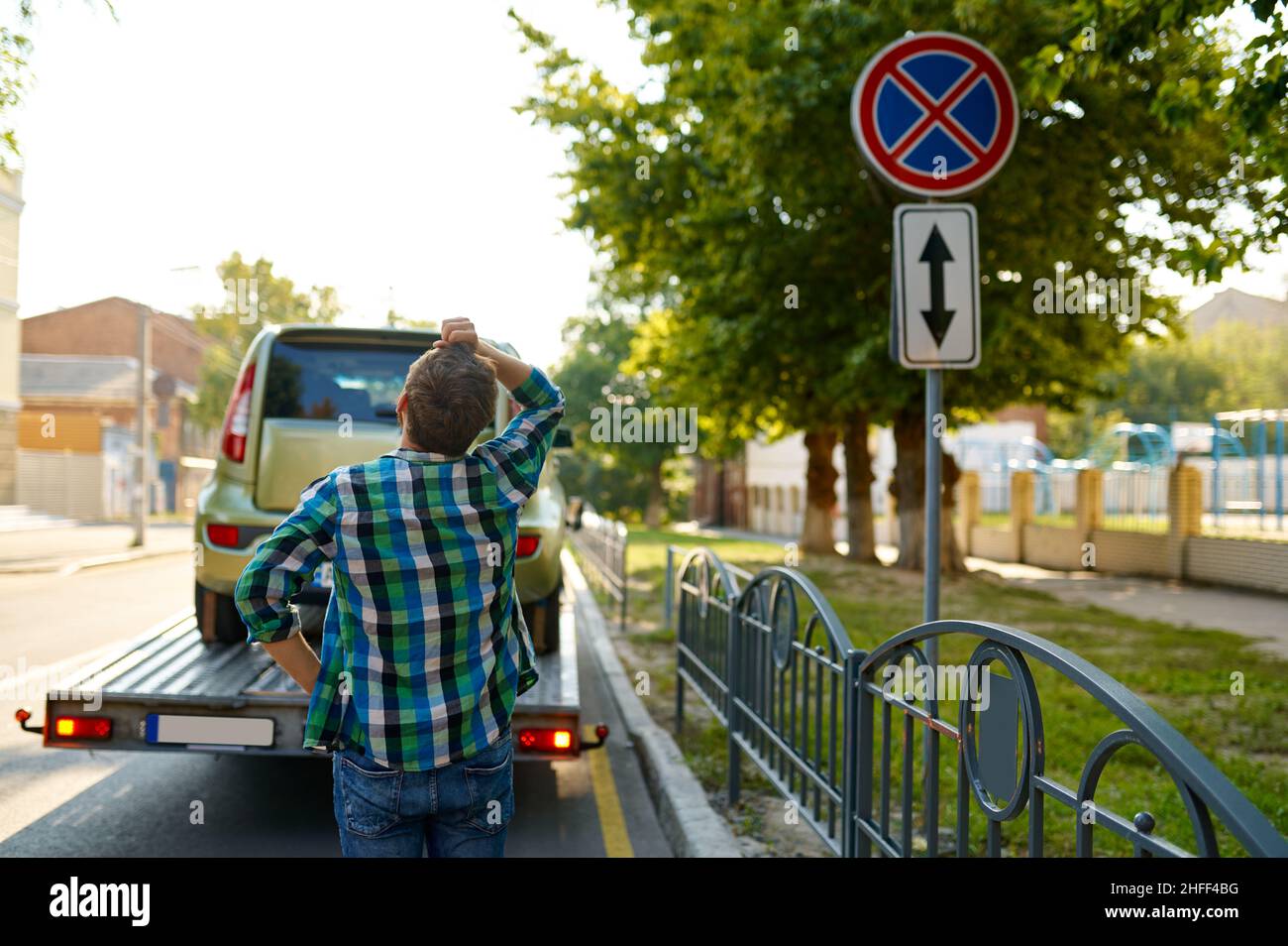 Worried driver having improper parking rule violation Stock Photo - Alamy