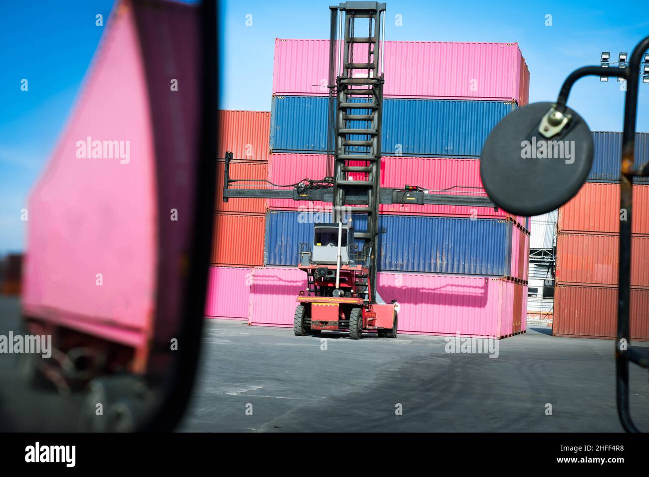 View of the container forklift from the truck Stock Photo - Alamy