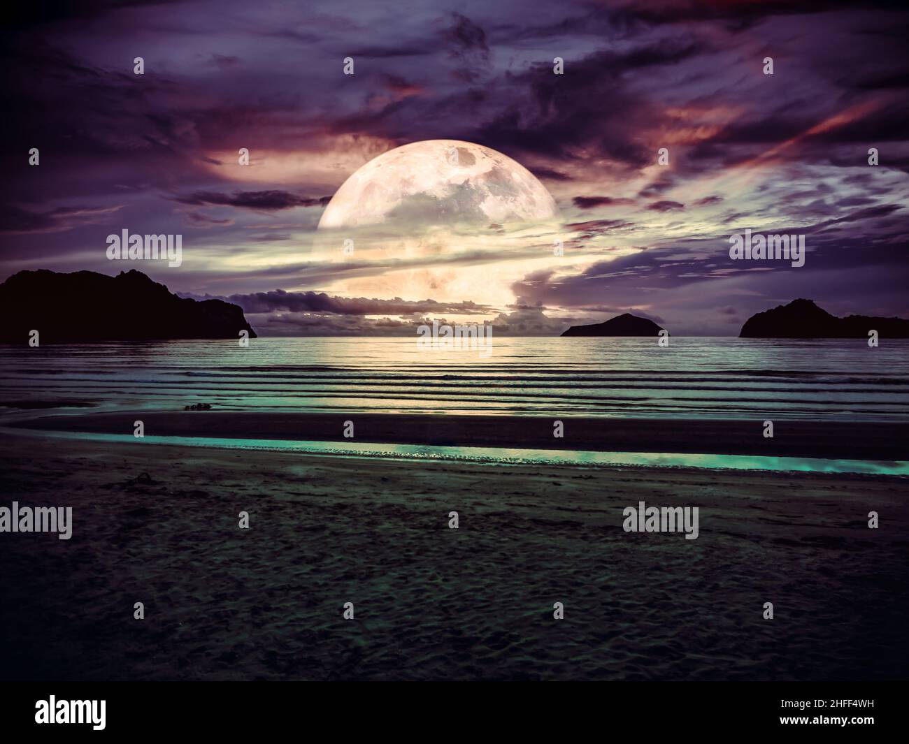 The Two Moons In Sky Over The Beach