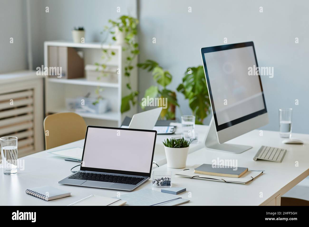 Background image of office workplace with mock up computer screens on ...