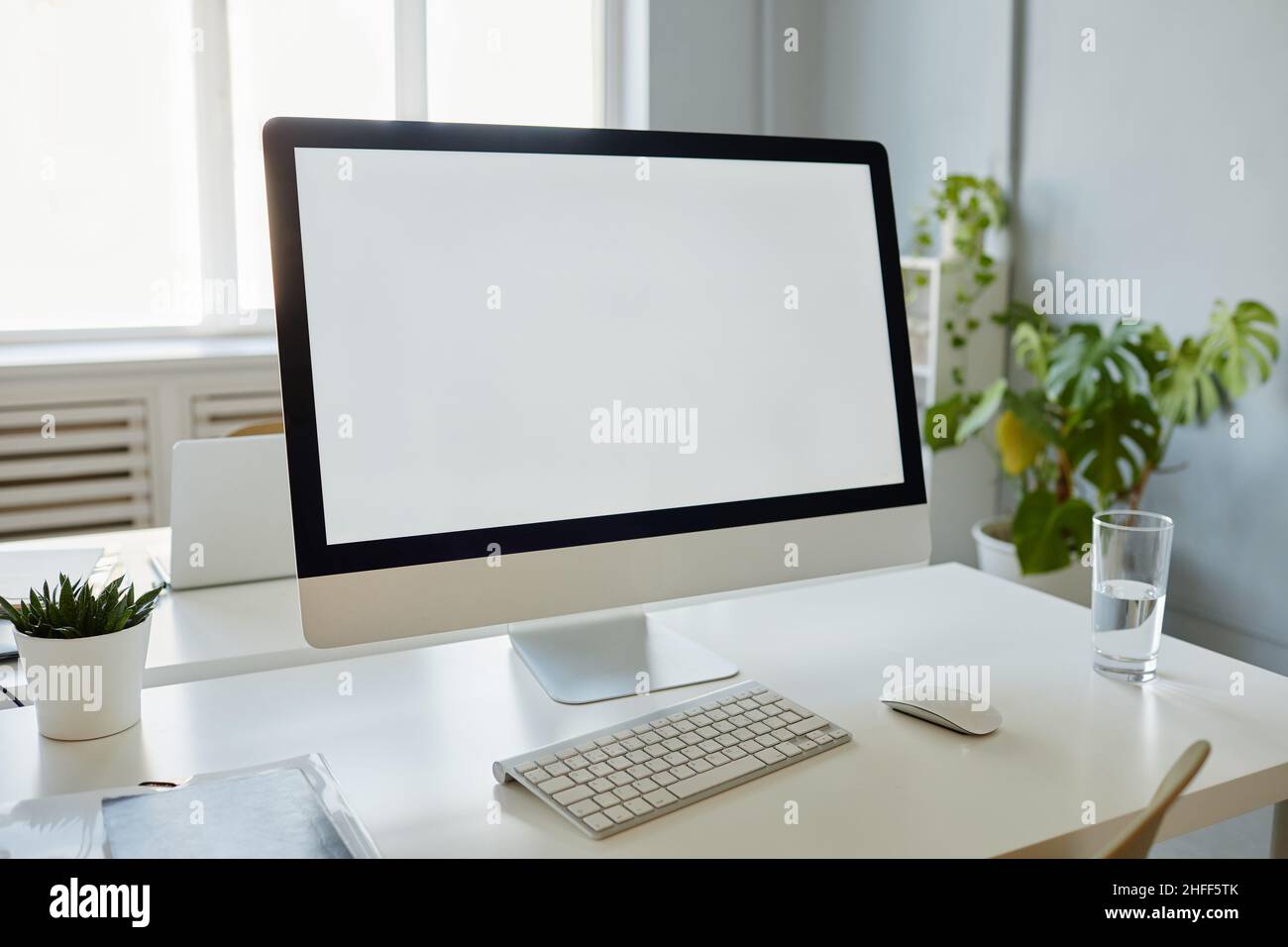 Minimal background image of office workplace with blank white computer ...