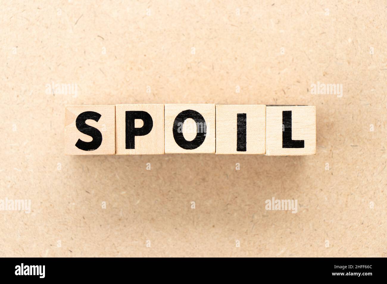 Alphabet letter block in word spoil on wood background Stock Photo - Alamy