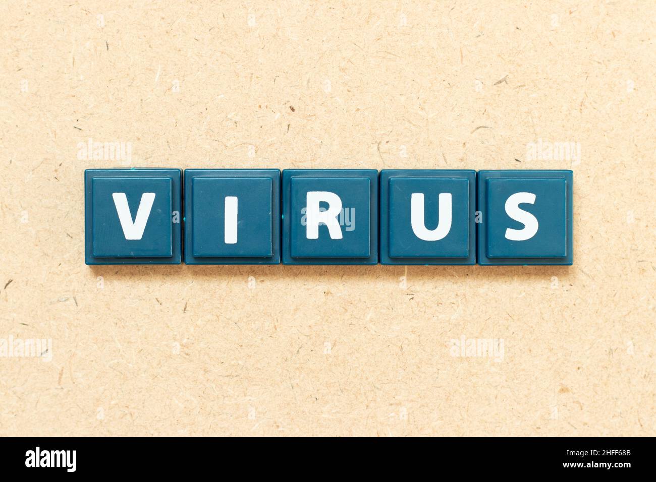 Tile alphabet letter in word virus on wood background Stock Photo - Alamy