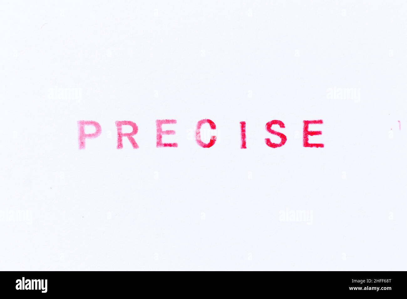 Red color ink rubber stamp in word precise on white paper background ...