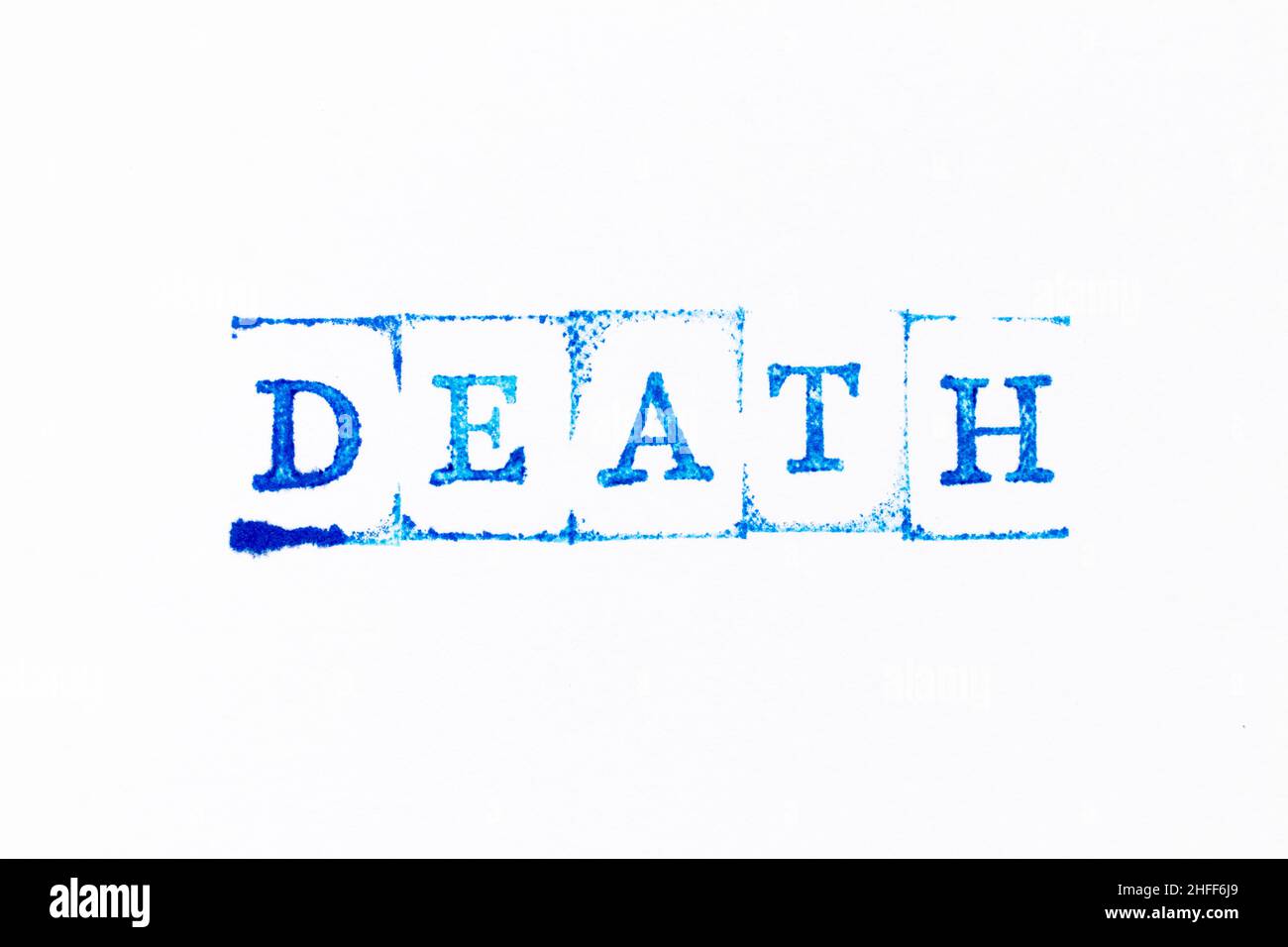 Blue color ink rubber stamp in word death on white paper background ...