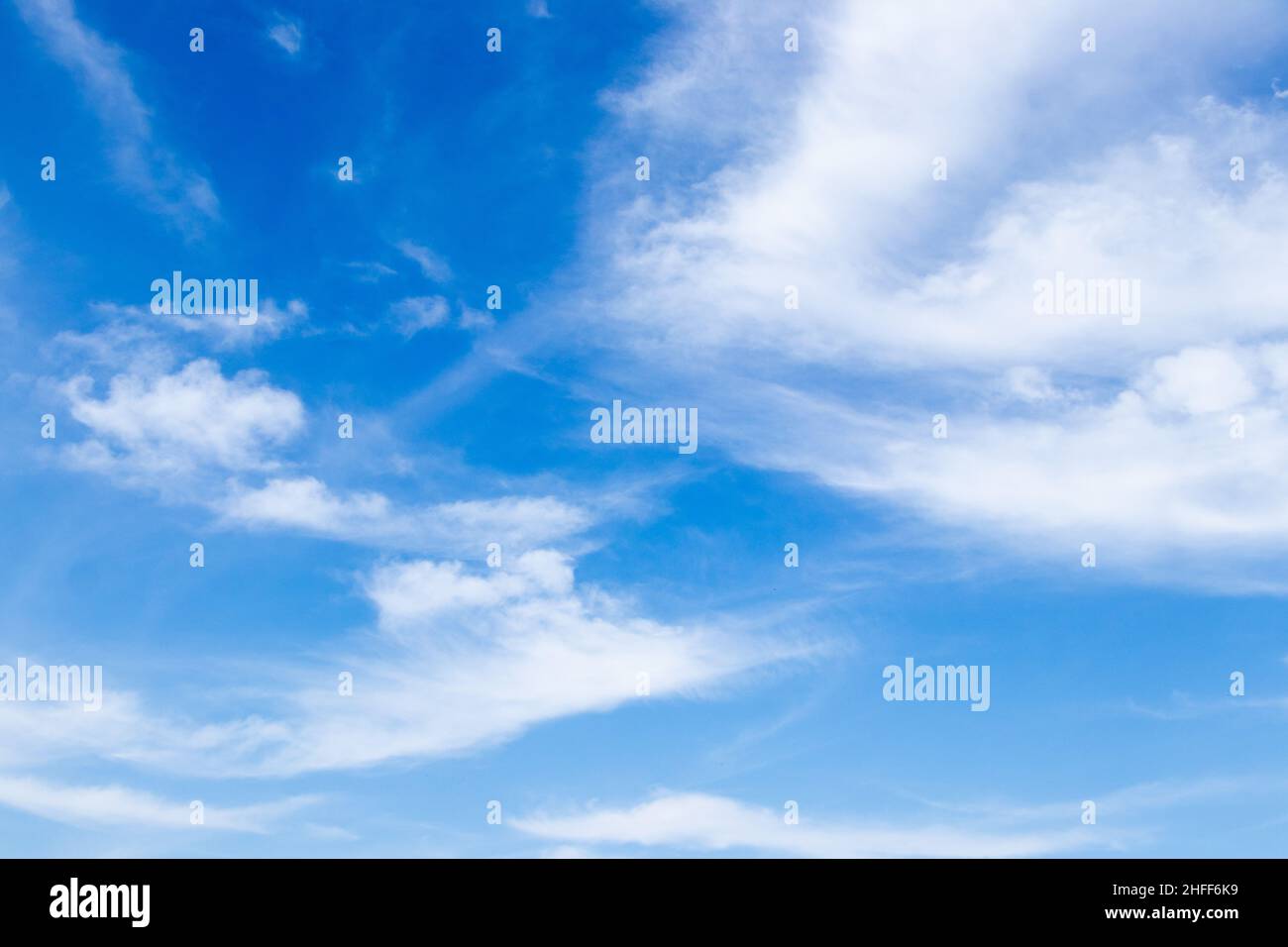 Clear blue color sky with white cloud background Stock Photo - Alamy
