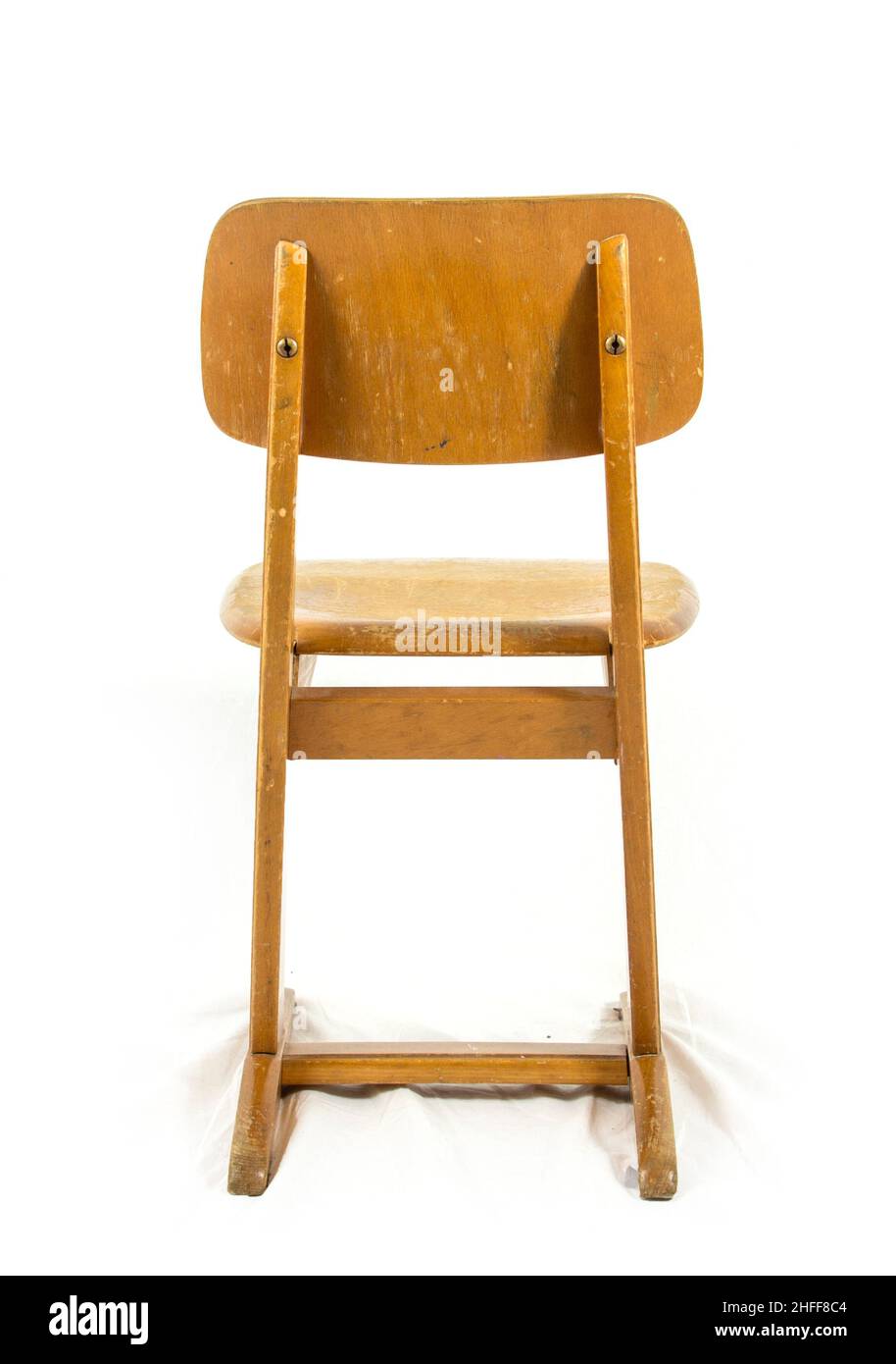 old german used wooden school chair for the young pupils Stock Photo ...