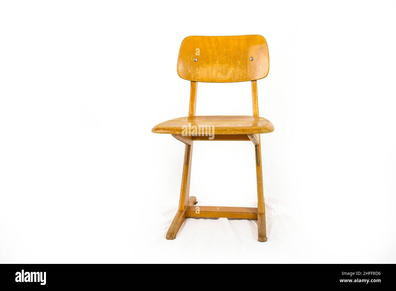 old german used wooden school chair for the young pupils Stock Photo ...