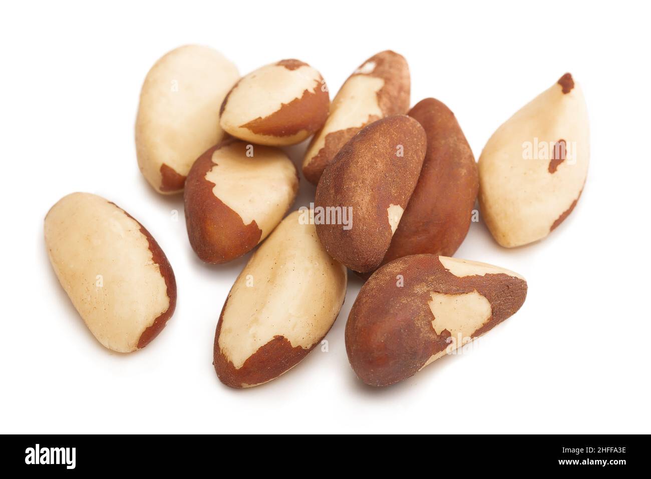 Brazil nuts isolated against white background Stock Photo - Alamy