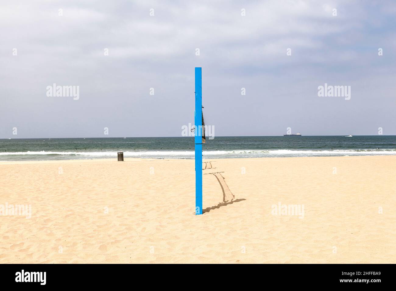 volleyball post at the beach in blue Stock Photo - Alamy