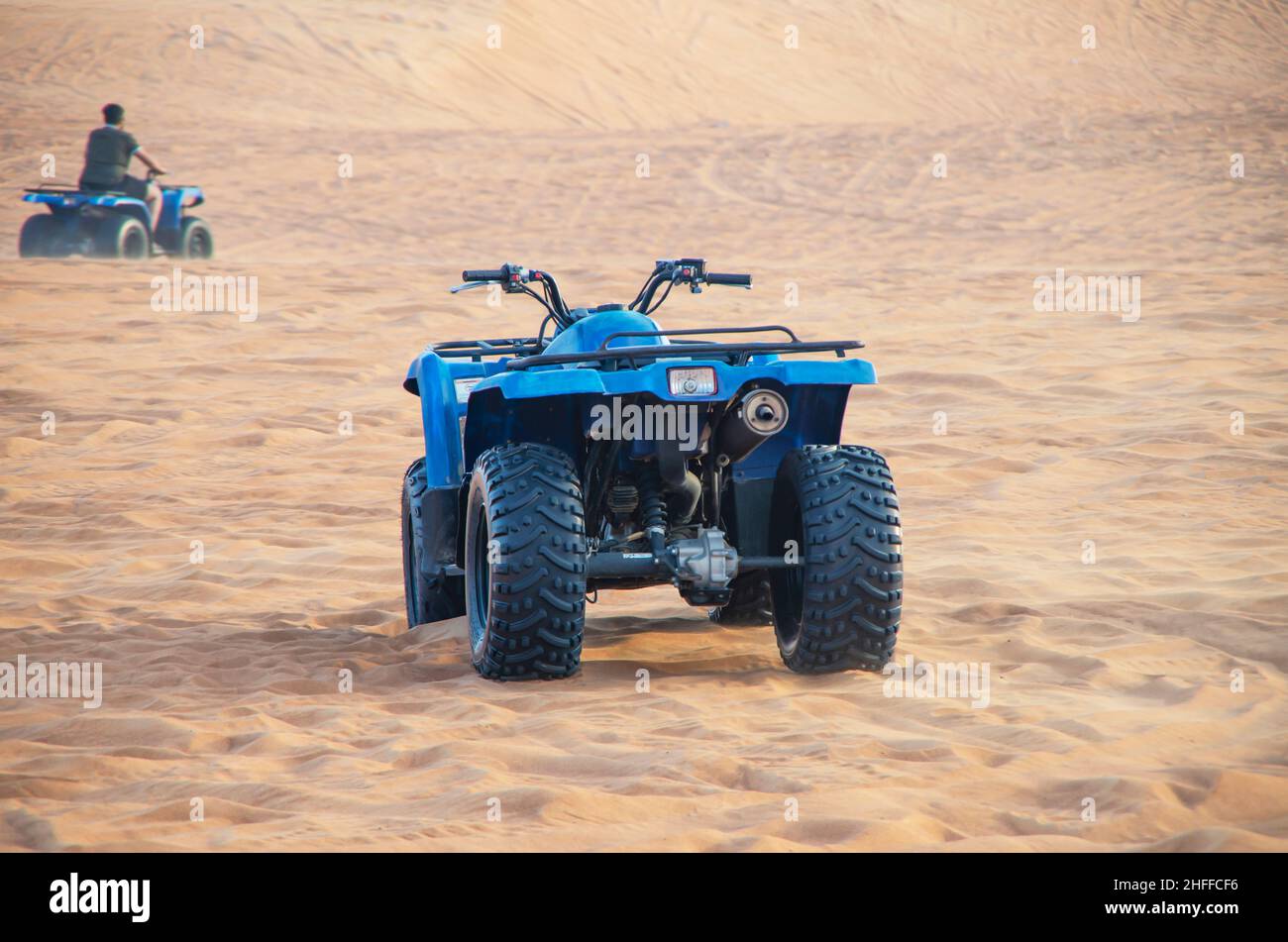 Powerful modern ATV sand among the Arabian sand dunes. Quad bike, The ...