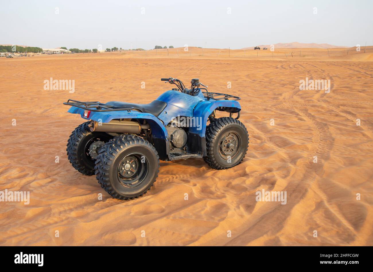 Powerful modern ATV sand among the Arabian sand dunes. Quad bike, The ...
