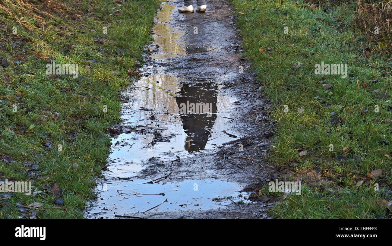 Puddle on ground hi-res stock photography and images - Alamy