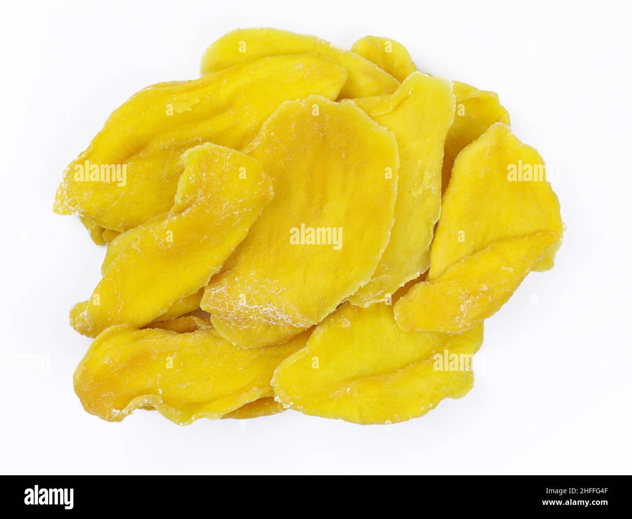 Dried pieces of mango on a white background. Sugar-free sliced dried ...