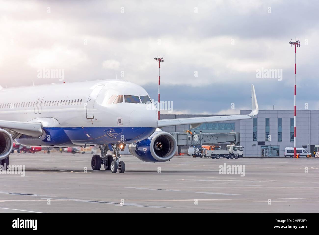 Commercial aircraft passing on the steering track after landing Stock ...